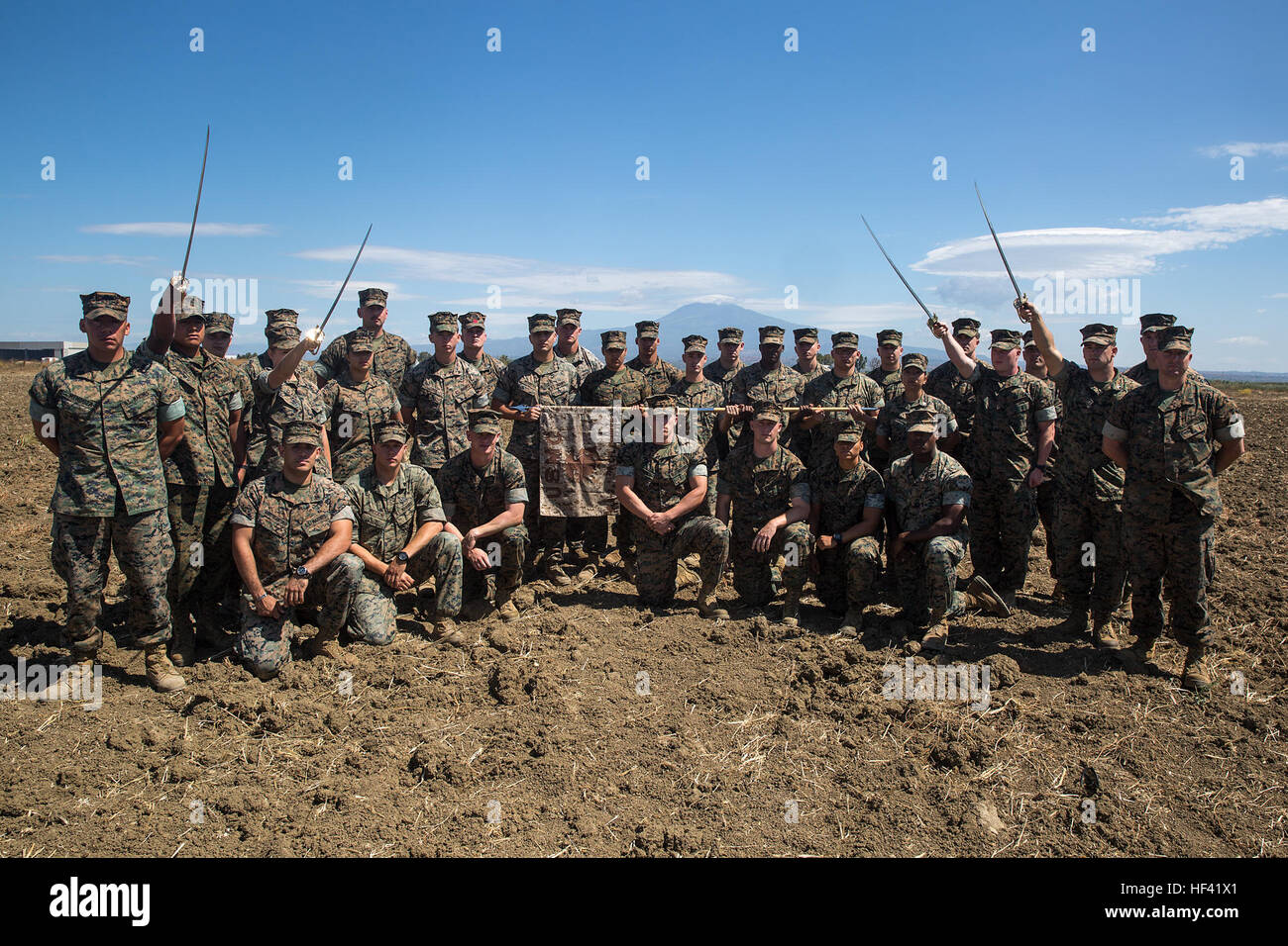 Marines in Corporals Course stand with their instructors for a group ...