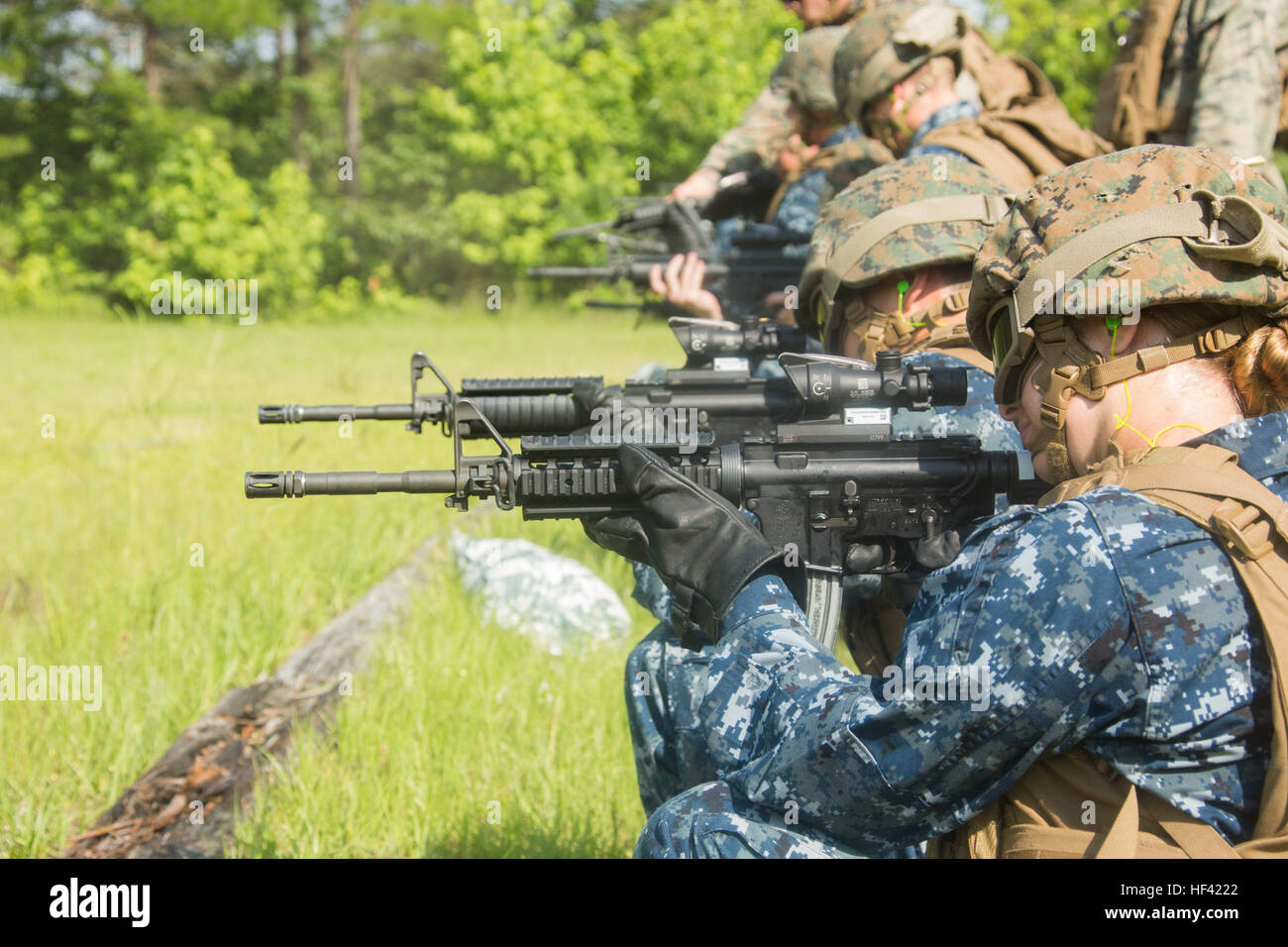 U.S. Naval Academy Midshipmen fire M4A1 service rifles during ...