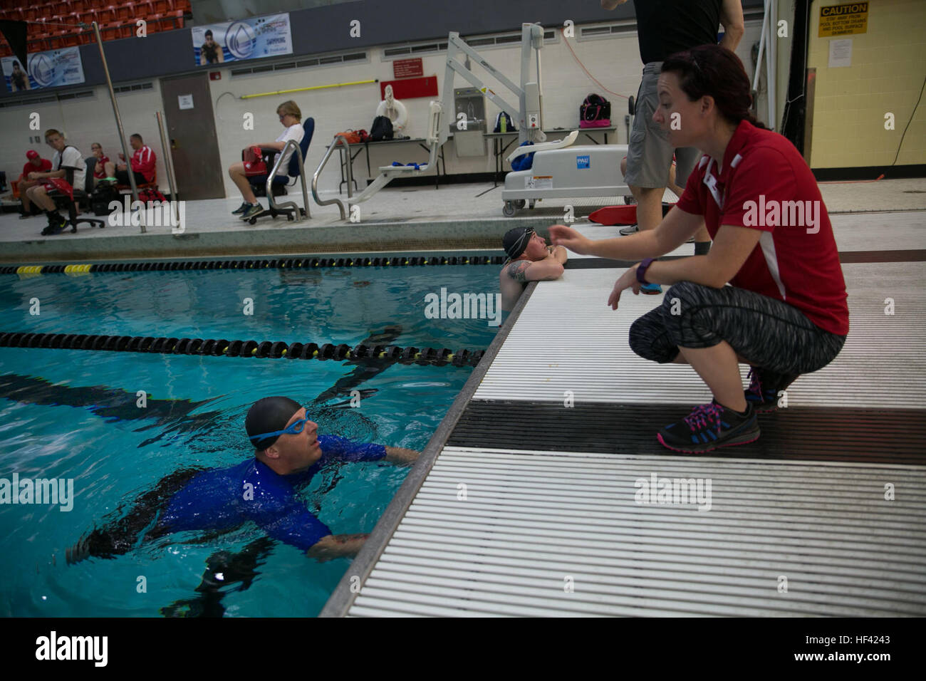 U.S. Marine Corps Staff Sgt. Brandon Dodson listens to feedback from ...