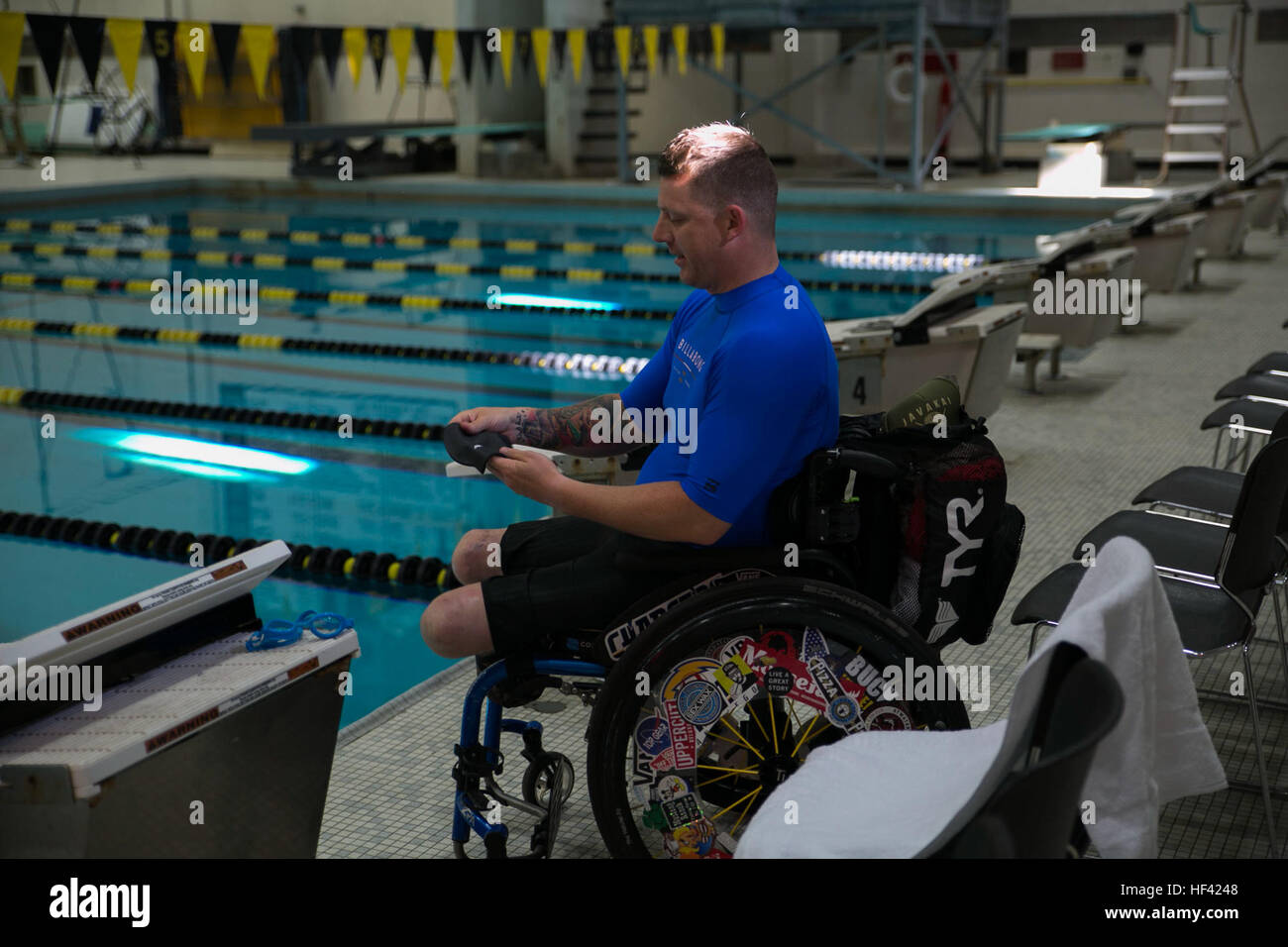 U.S. Marine Corps Staff Sgt. Brandon Dodson prepares for swim practice ...
