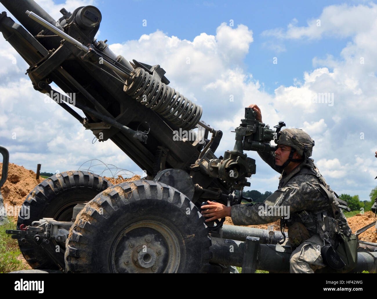 New York Army National Guard Sgt. Erik Paredes, a M119 gunner assigned ...