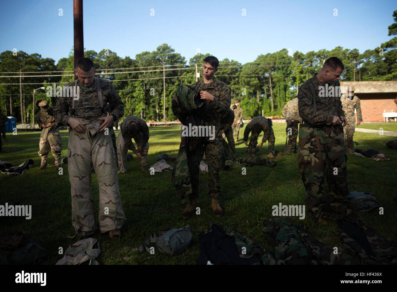 Marines don their Mission-Oriented Protective Posture, or MOPP, gear in ...