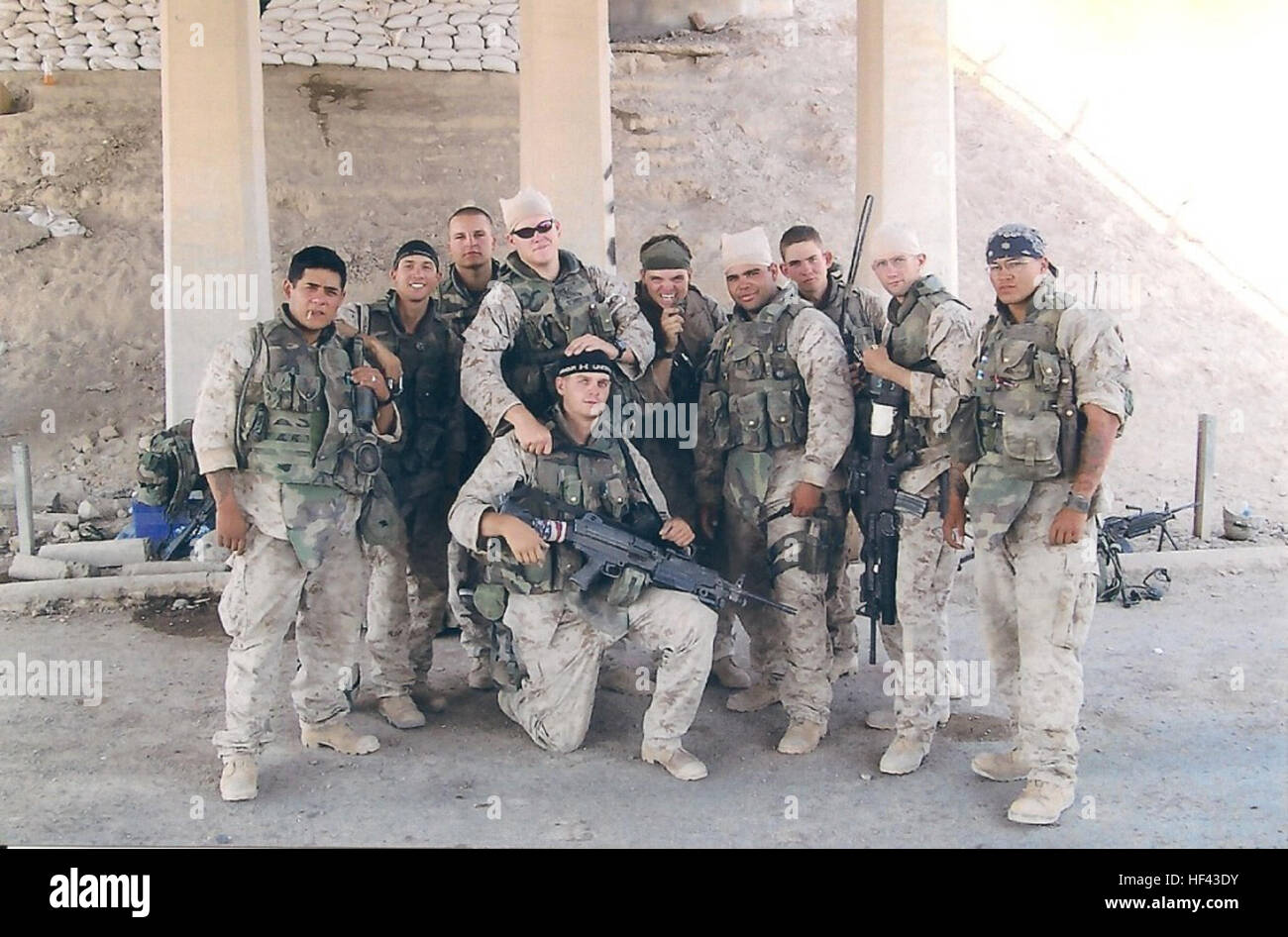 Marine veteran Lance Cpl. Chase Savage poses with his unit, the 24th ...