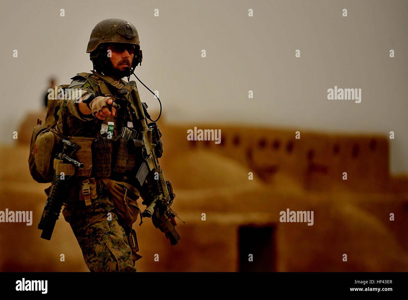 A MARSOC Marine instructs ANA soldiers to set up a security perimeter ...