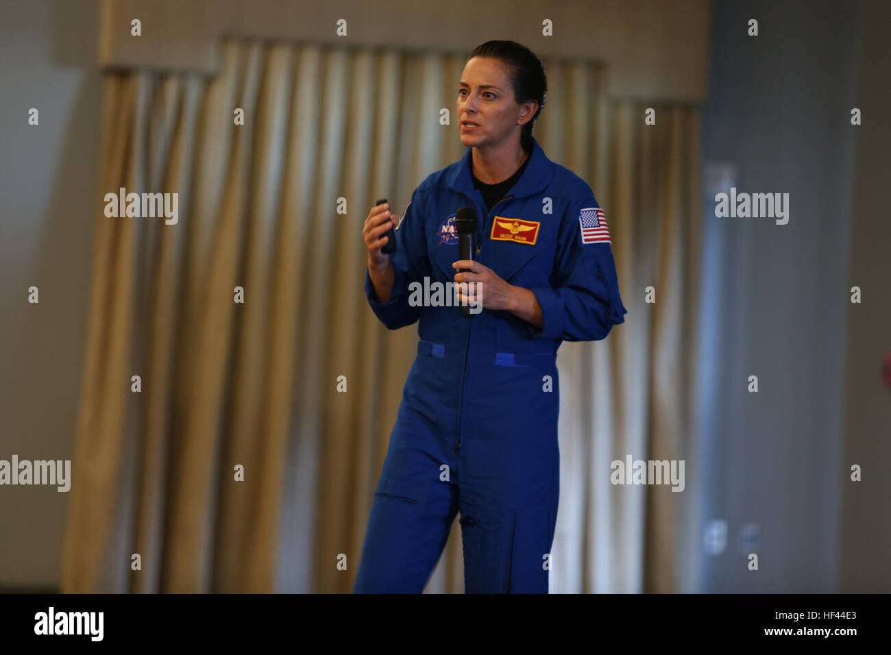 Lt. Col. Nicole “Duke” Mann speaks to Marines during a seminar aboard ...