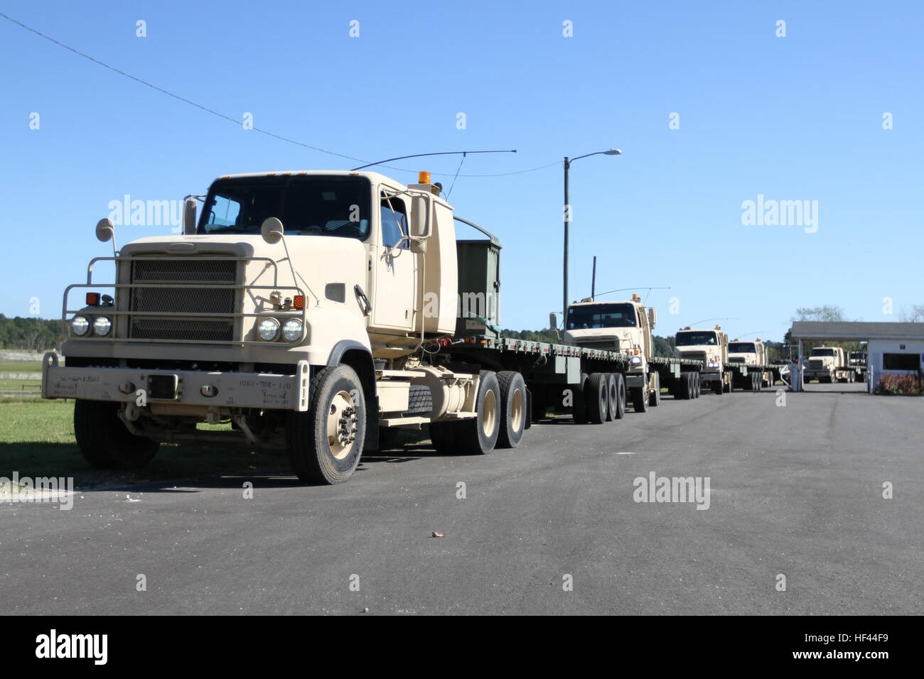 Trucks from the 1050th Transportation Battalion arrive at the Wateree ...