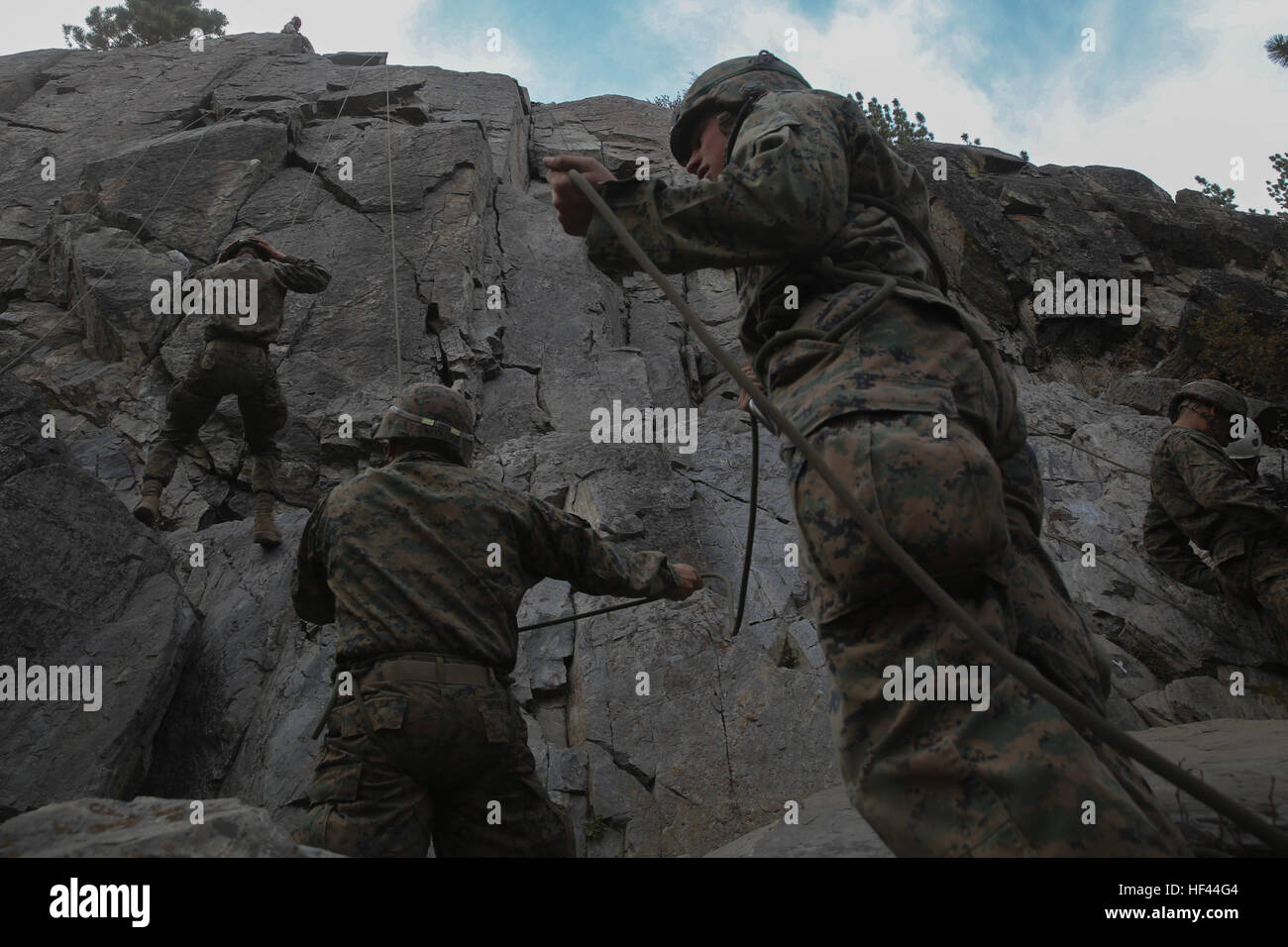 Marines with Company L, 3rd Battalion, 4th Marine Regiment, conduct top ...