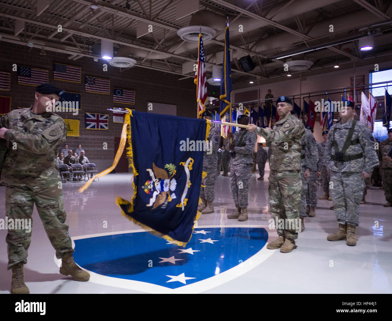 The 1st Battalion, 297th Infantry Regiment uncases its battalion colors ...