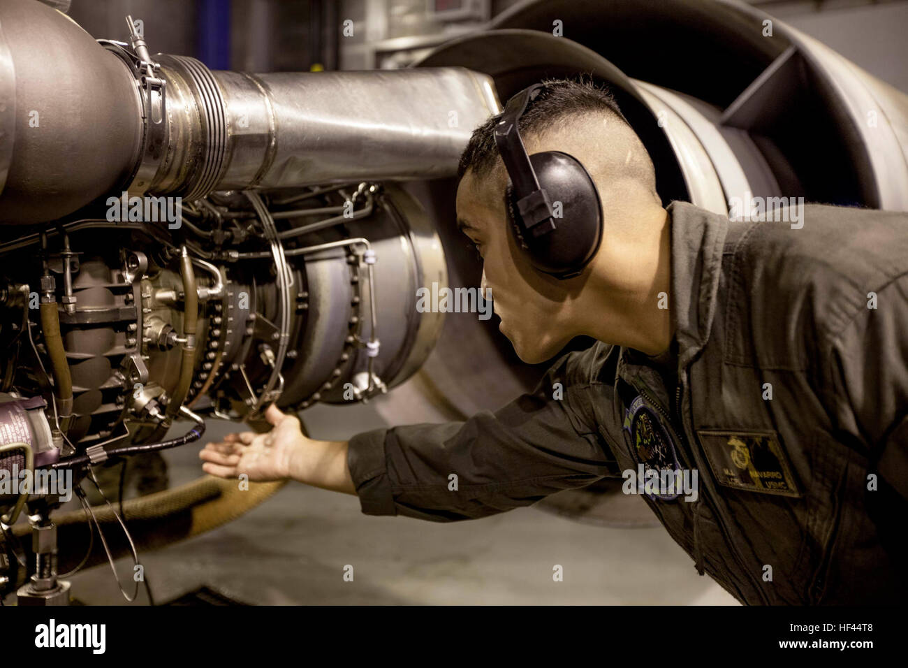 U.S. Marine Corps Lance Cpl. Manuel J. Navarro, a helicopter power ...