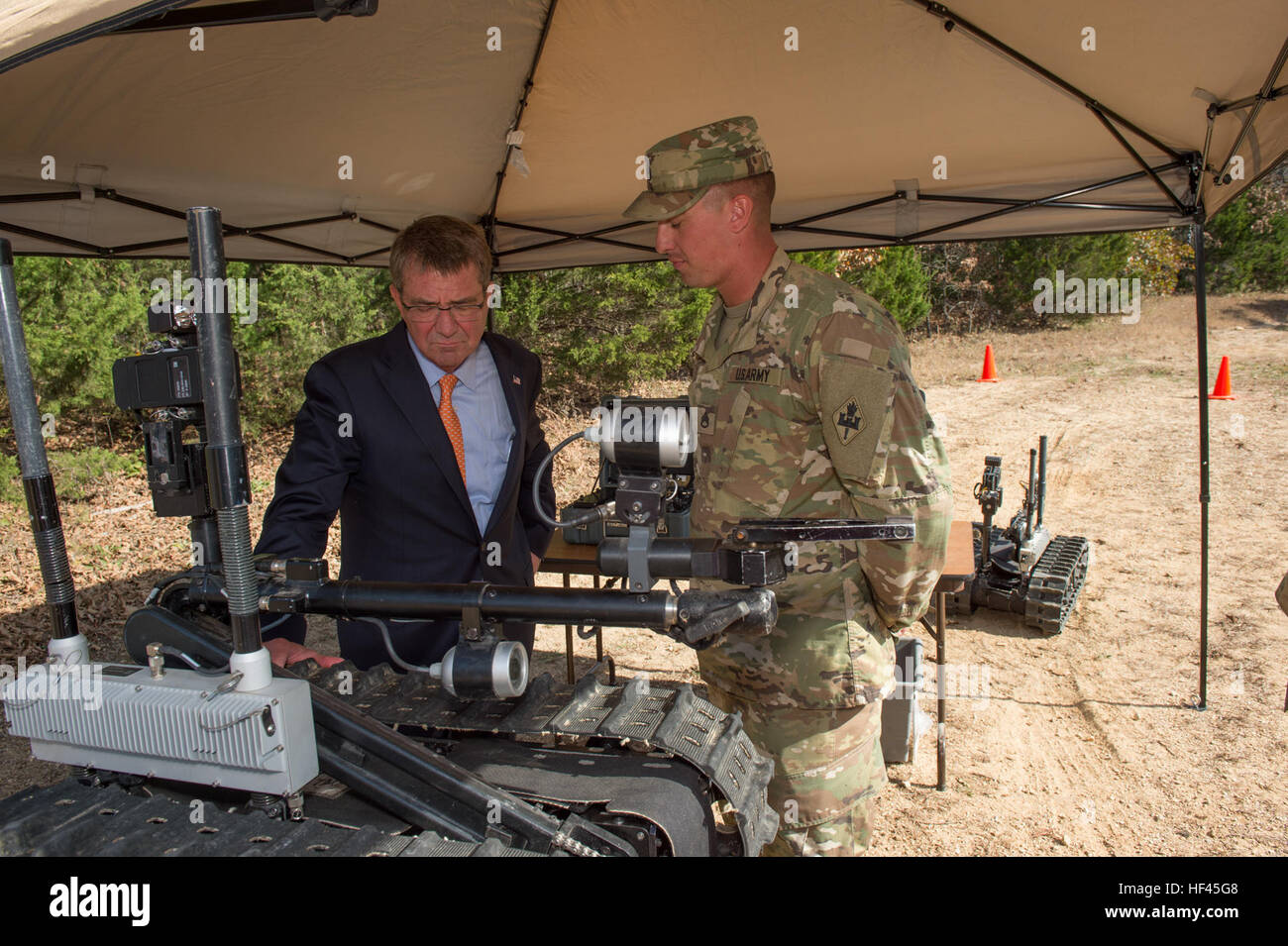 Secretary of Defense Ash receives a brief on route clearance and robot ...