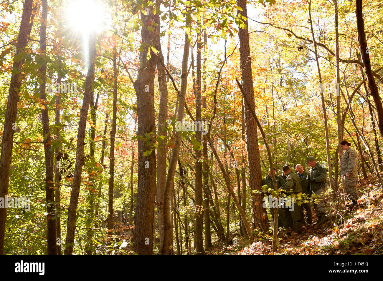 North Carolina Air National Guard members use a compass and map to ...