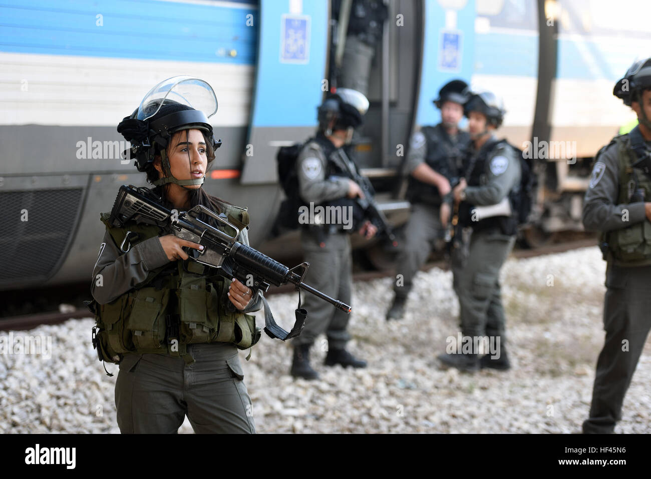 An Israel Police officer stands guard during a simulated terrorist ...
