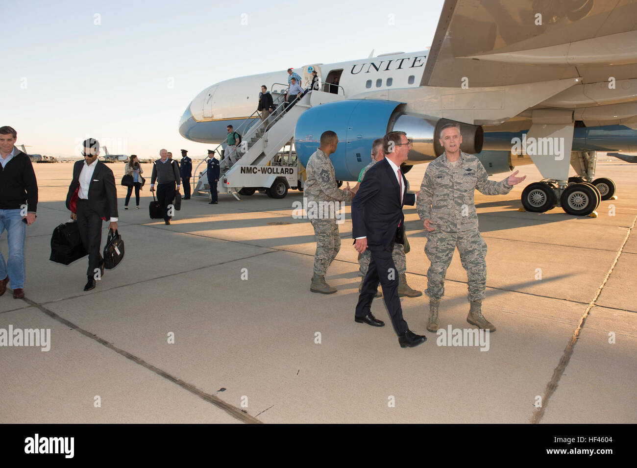 Secretary of Defense Ash Carter is greeted by the Commander of the ...