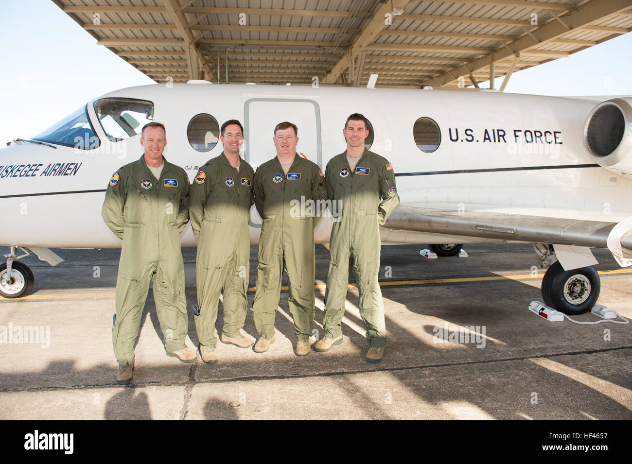 T-1 aircraft pilots stand beside their aircraft during a visit to Joint ...