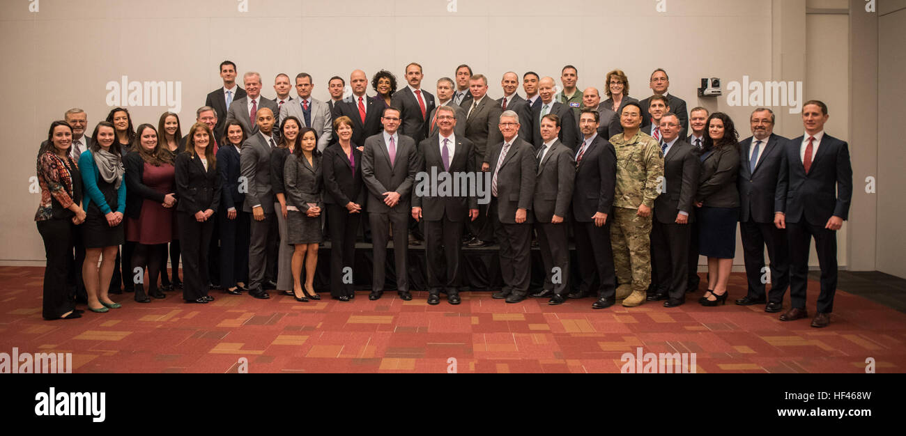 Secretary of Defense Ash Carter poses for a group photo with staff from ...