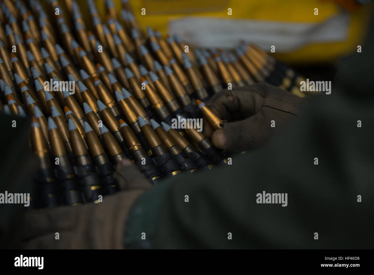 Sgt. Kevin Carpio sets up .50 caliber ammunition at Kadena Air Base ...