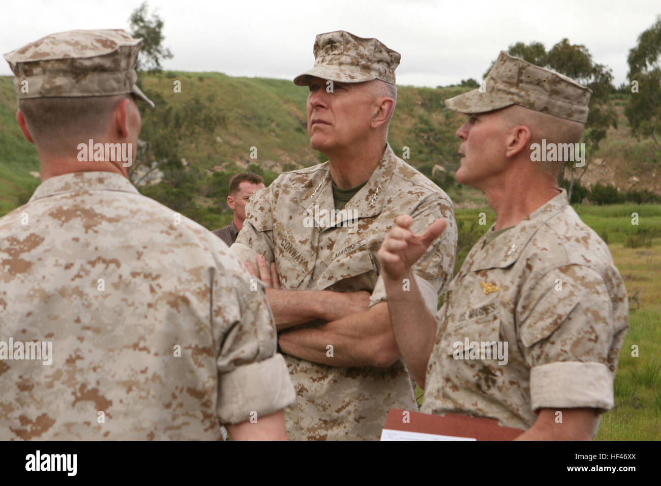Gen. James T. Conway, commandant of the Marine Corps, speaks with Col ...