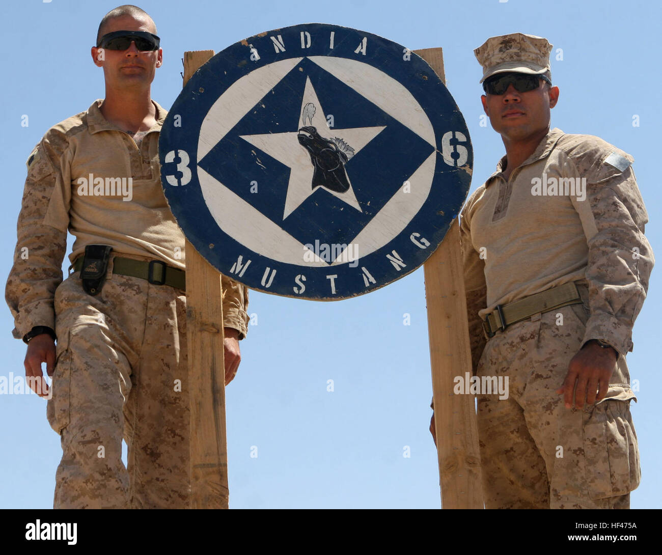 U.S. Marine Corps 1st Sgt. Edwin Mota (right),the company first ...