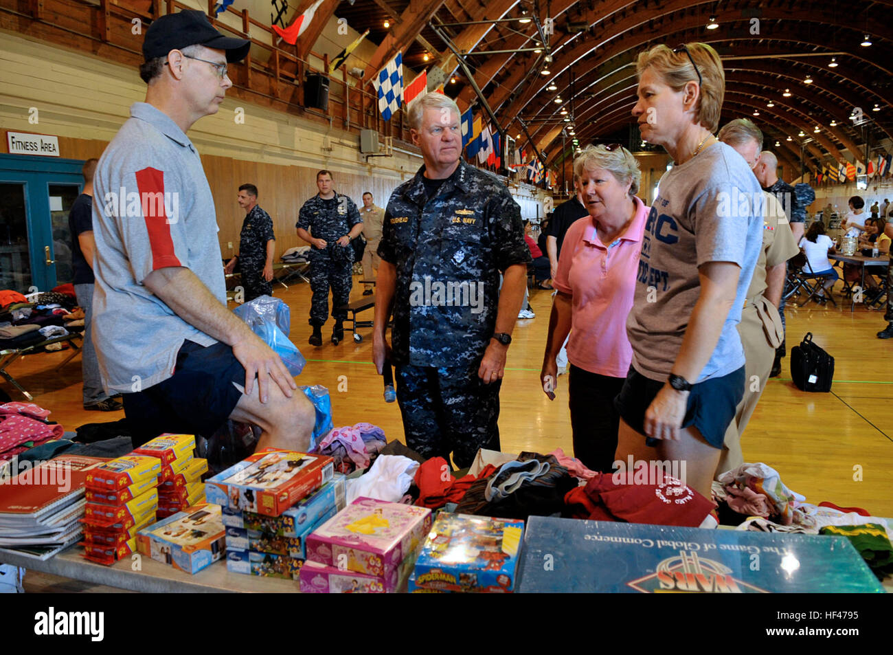 Chief of Naval Operations Adm. Gary Roughead, center left, and his wife ...