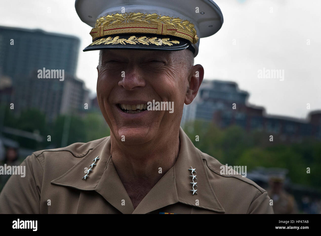 Gen. James T. Conway, commandant of the Marine Corps hears a joke from ...