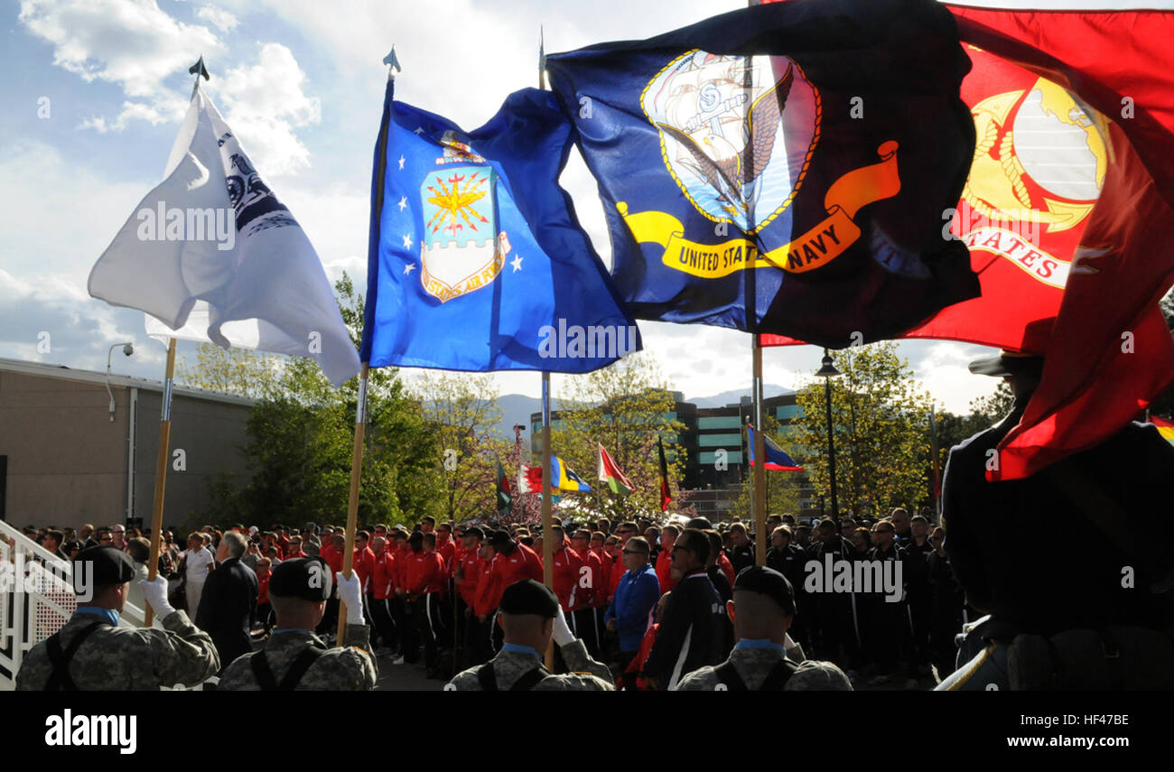 A U.S. Army color guard from Fort Carson, Colo., display service flags ...