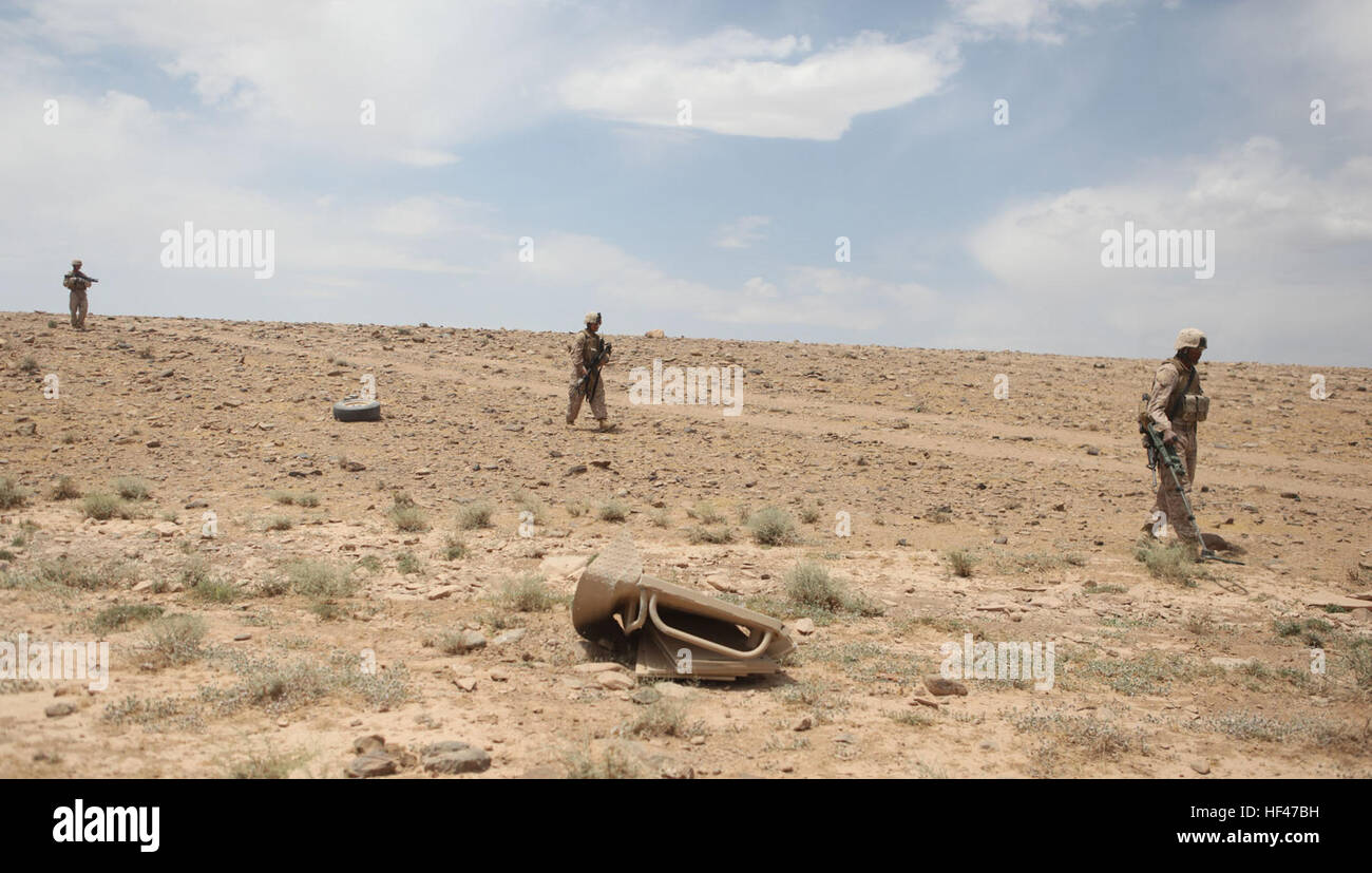 Three Marines with 3rd Route Clearance Platoon, Alpha Company, 3rd ...
