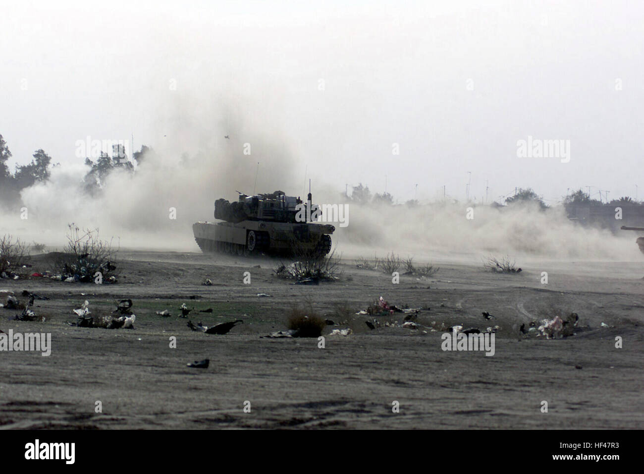 A Marine Corps (USMC) M1A1 Abrams Main Battle Tank (MBT) fires its ...