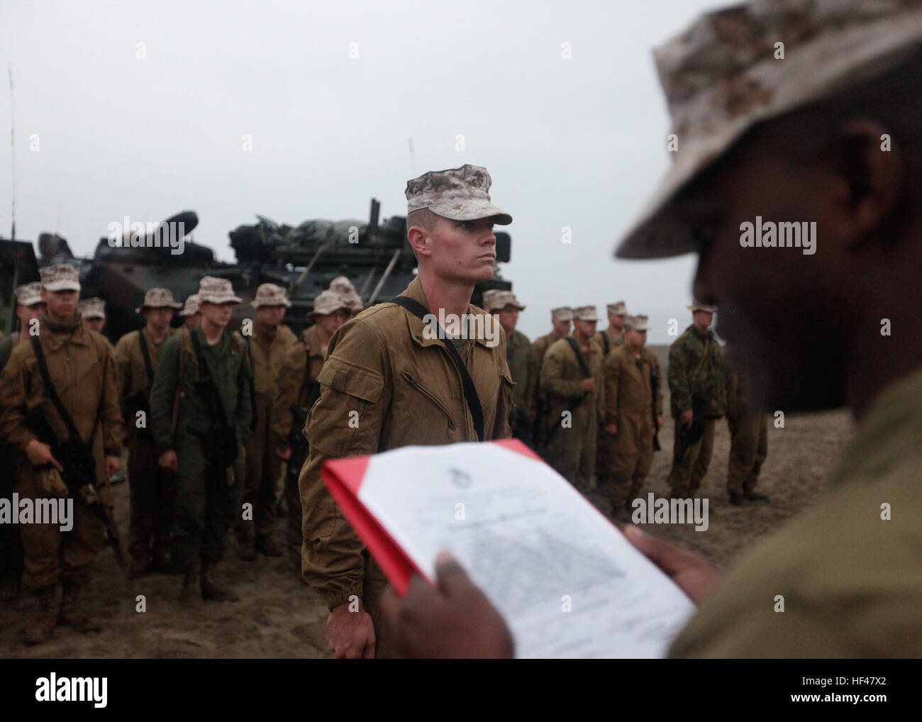 U.S. Marine Corps Gunnery Sgt. Sims, right, with 4th Platoon, Company C ...