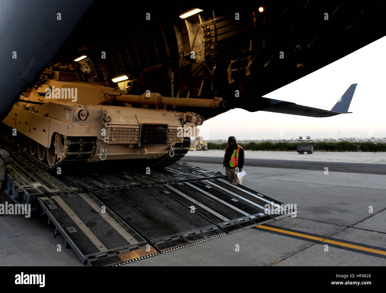 U.S. Marine Corps M1A1 Abrams tank drives up the ramp of a U.S Air ...