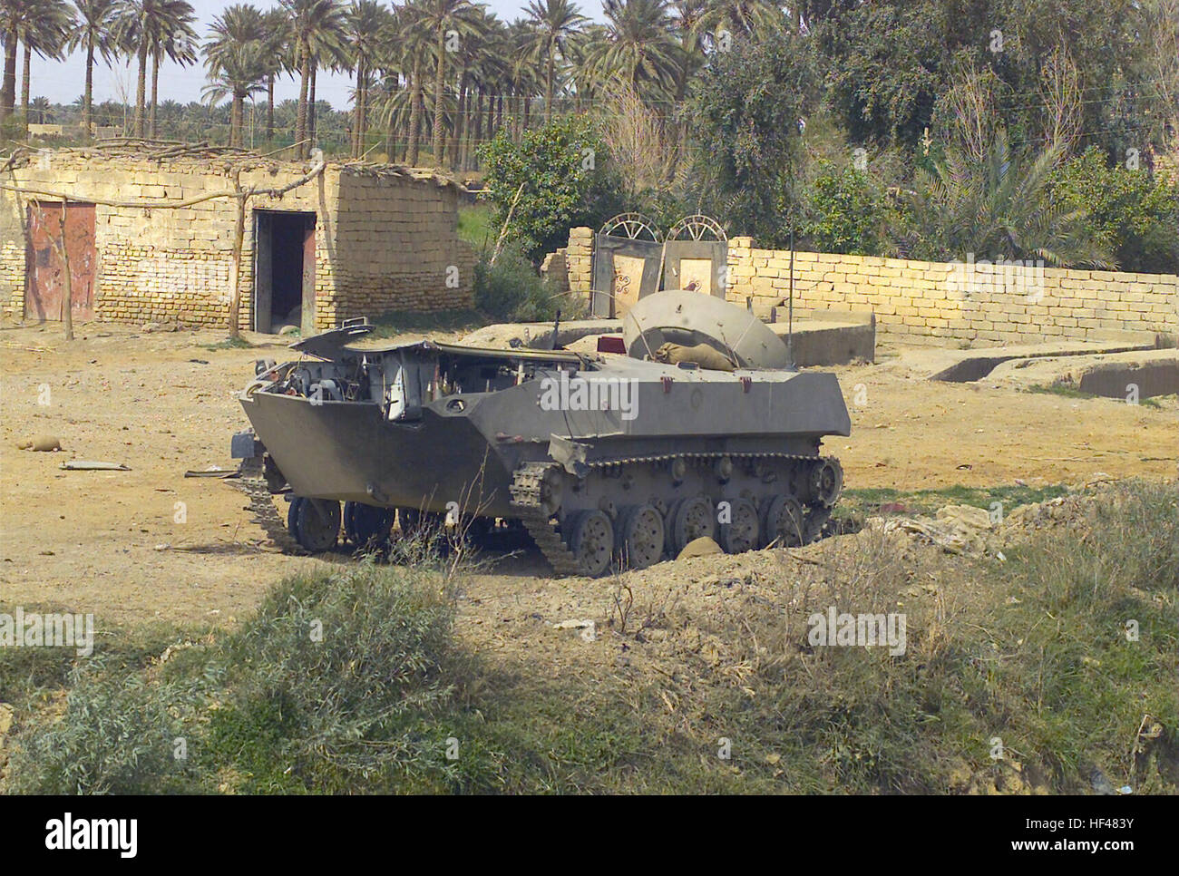 A destroyed Iraqi BMP-2 Infantry Fighting Vehicle sits near an ...