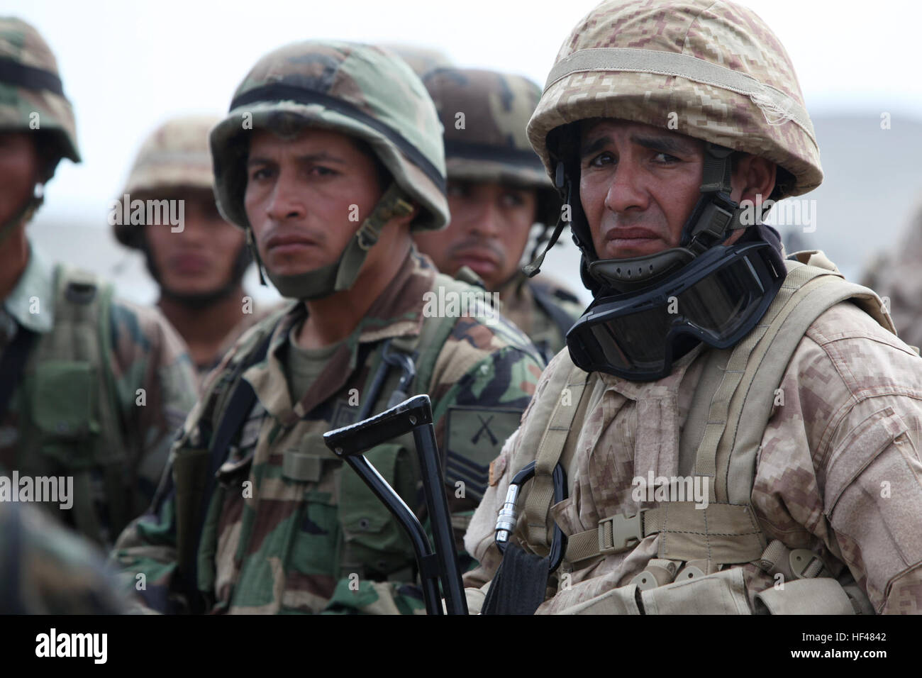 Peruvian Marines listen to a safety brief with U.S. Marine reserves ...