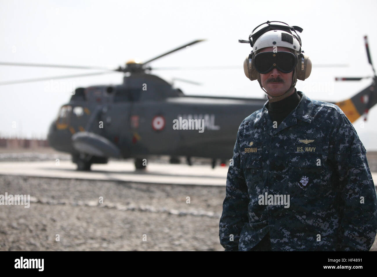 U.S. Navy Capt Peter J. Brennan, Commodore of the amphibious transport ...