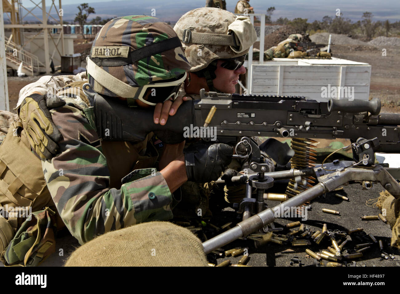 A Malaysian soldier and U.S. Marines conducted a weapons firing ...