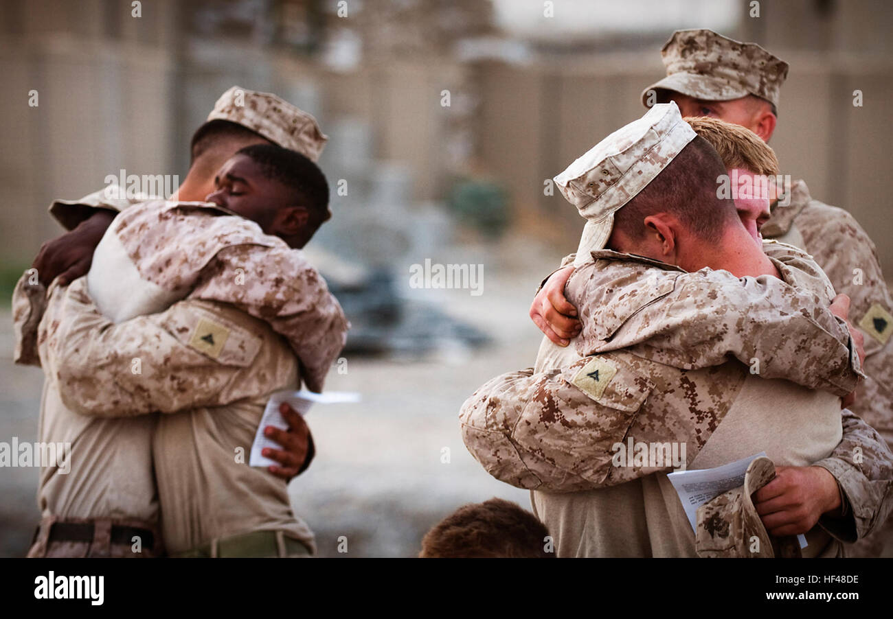Marines from Sgt. Joe L. Wrightsman’s squad embrace each other after ...
