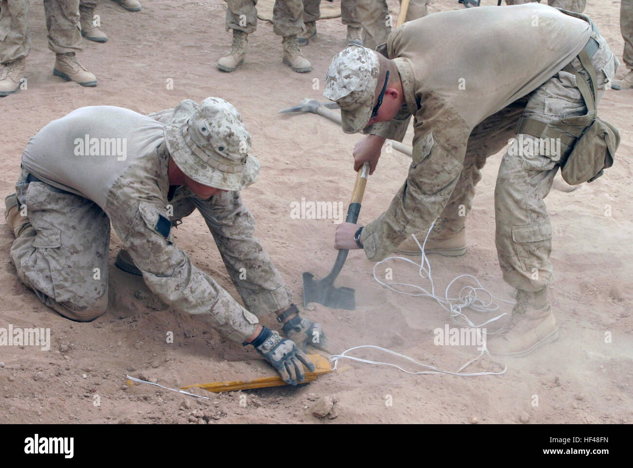 Marines with 2nd Battalion, 9th Marines, simulate the emplacement of an ...