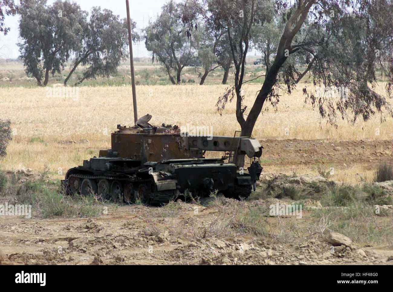 A destroyed an abandoned Iraqi military Armored Recovery Vehicle sits ...