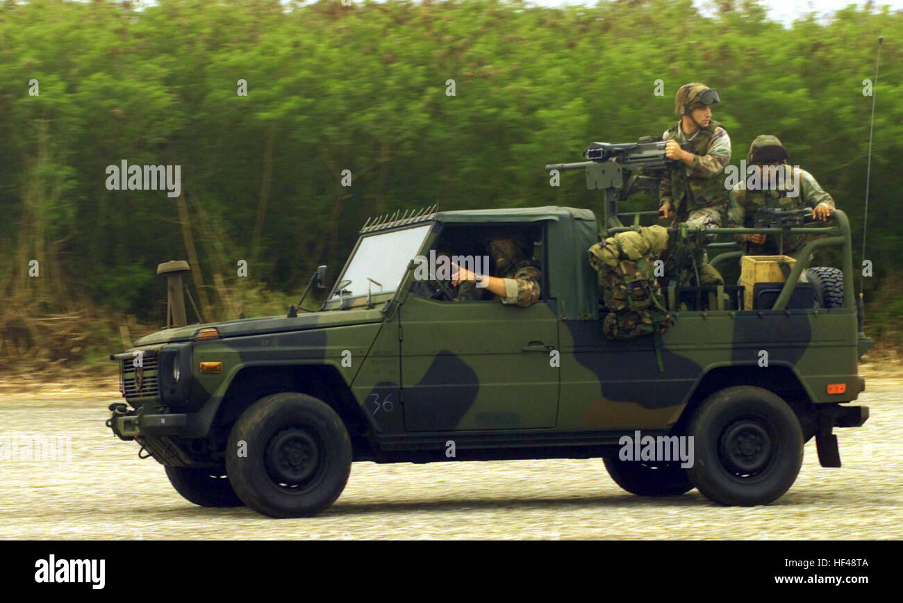 Marines from Weapons Company (WC), 2nd Battalion, 4th Marine Regiment ...