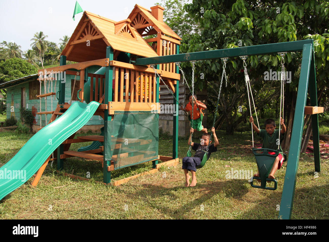 Panamanian children swing on the swing set of a playground, Oct. 2 ...