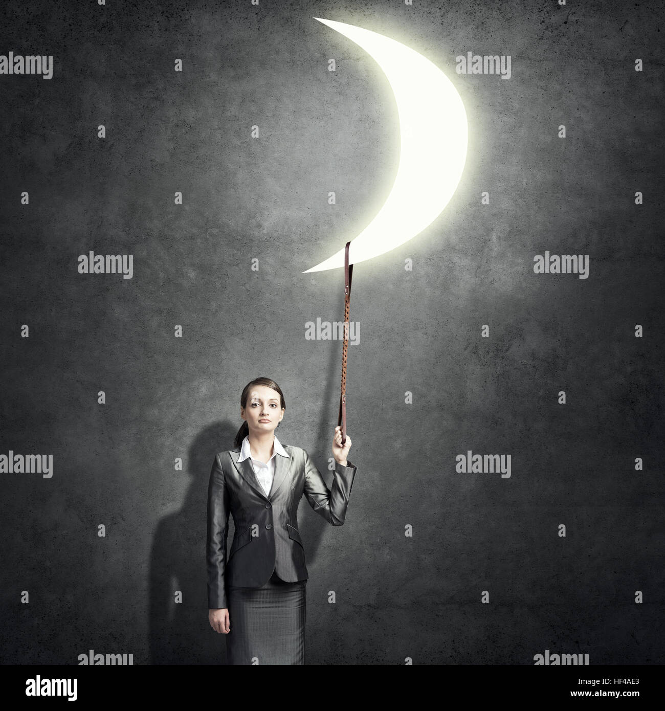 Woman catch moon Stock Photo - Alamy