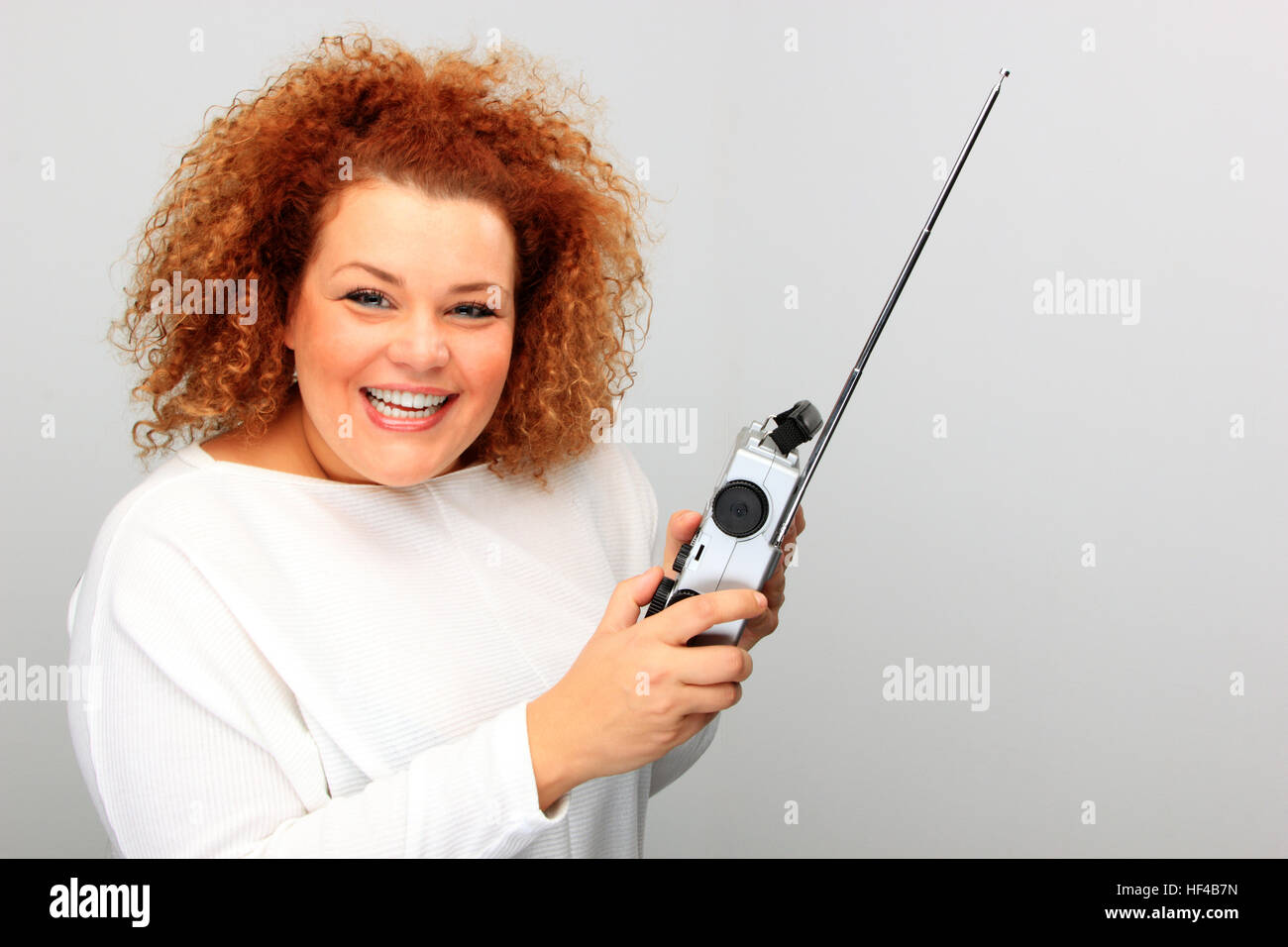 pretty girl with portable radio listening music Stock Photo - Alamy