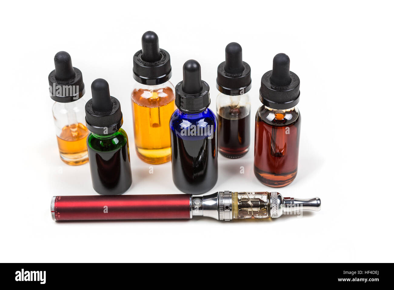 Assorted flavors of vape juice and an ecigarette isolated on white ...