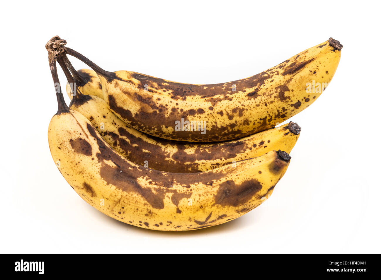 Bunch of overripe bananas isolated on white background Stock Photo - Alamy
