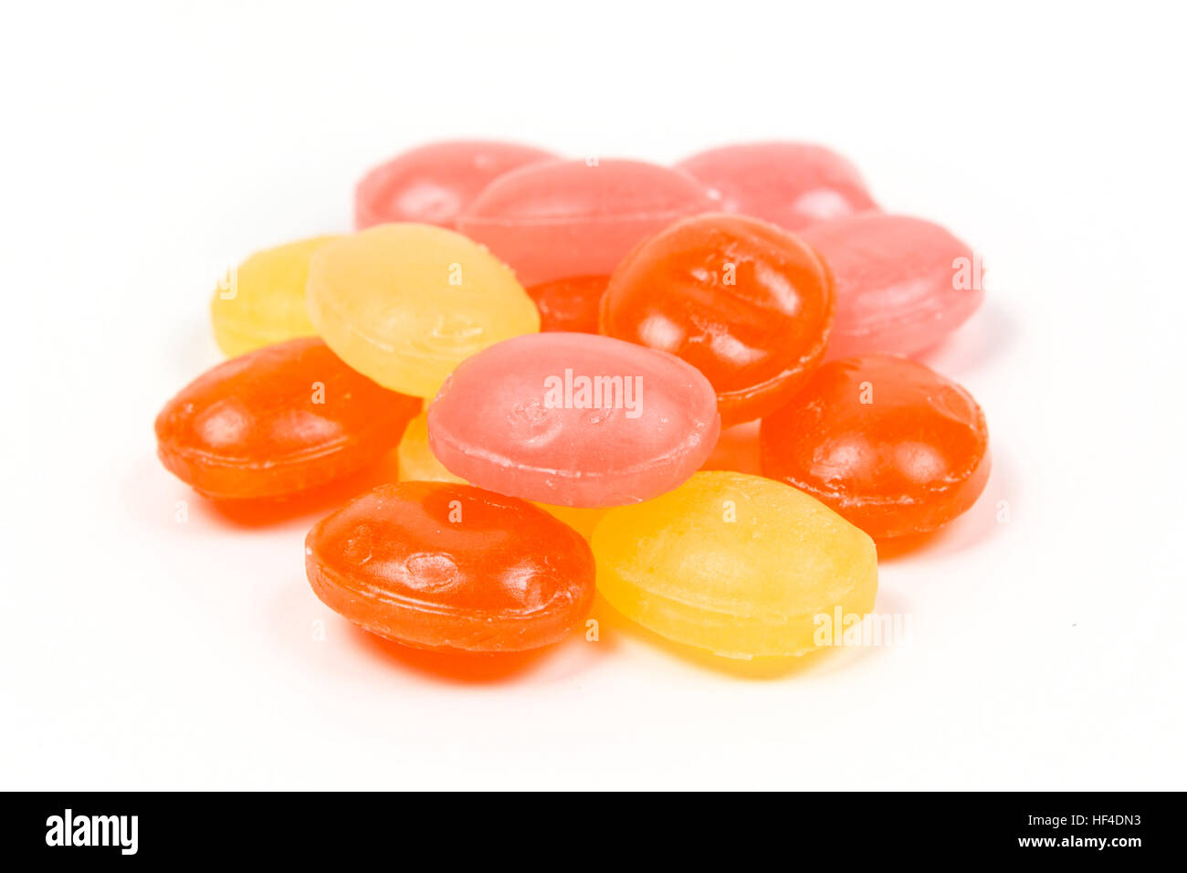 Fruity cold lozenges isolated on white background Stock Photo - Alamy