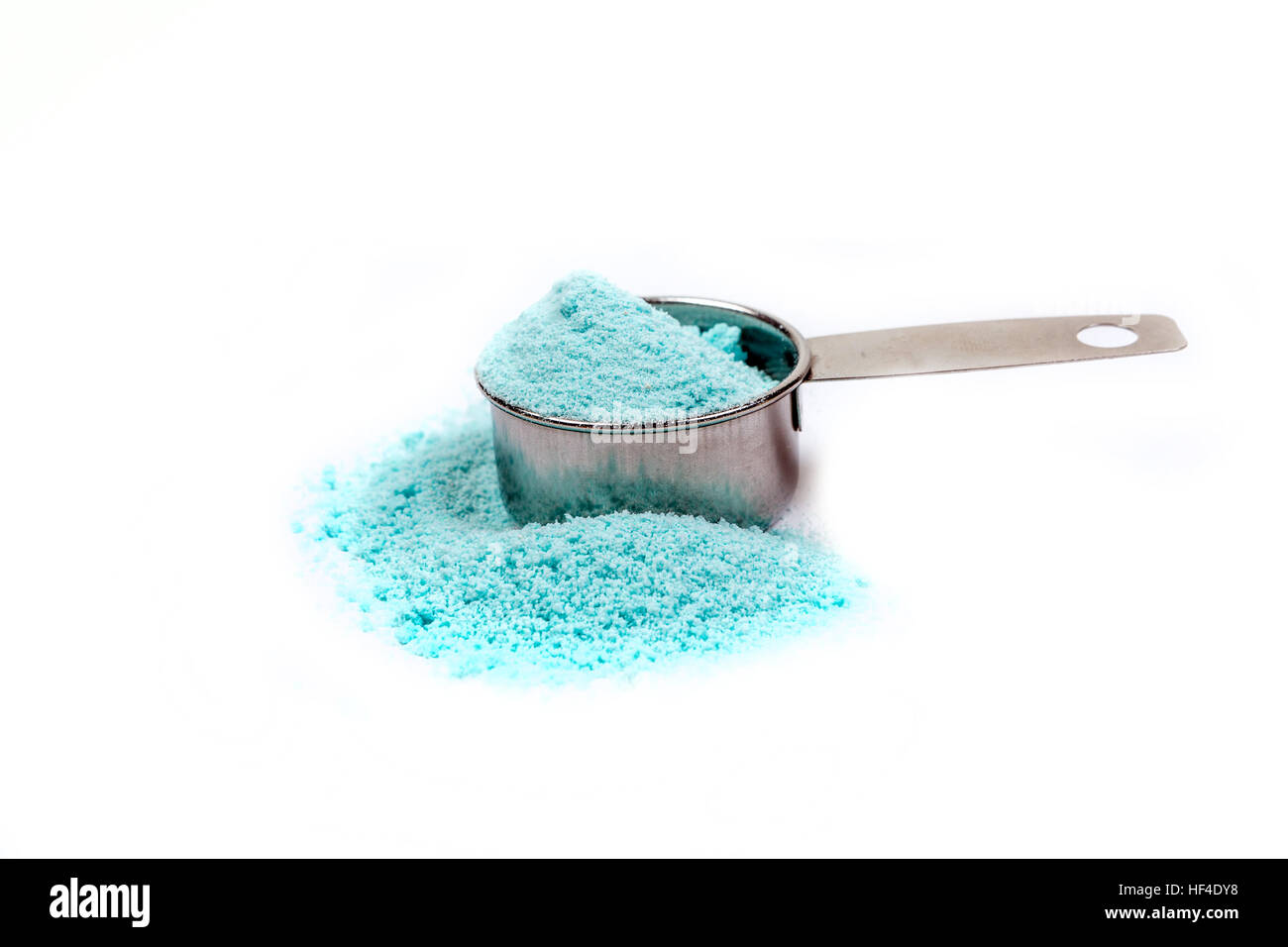 Scoop of laundry detergent isolated on white background Stock Photo - Alamy