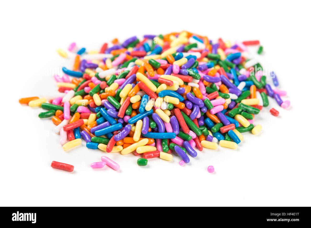 Assorted rainbow colored sprinkles isolated on white background Stock ...