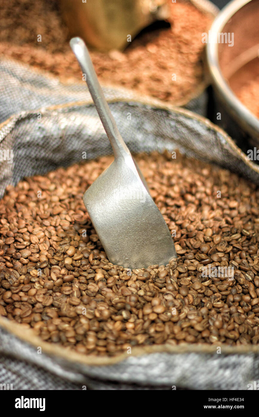 close up of coffee beans with a big spoon at a coffee shop Stock Photo ...
