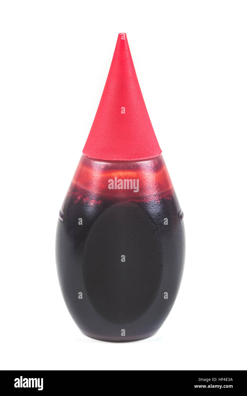 Red food coloring isolated on white background Stock Photo - Alamy