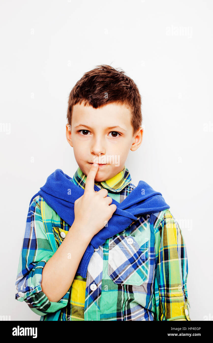 young pretty little boy kid wondering, posing emotional face isolated ...