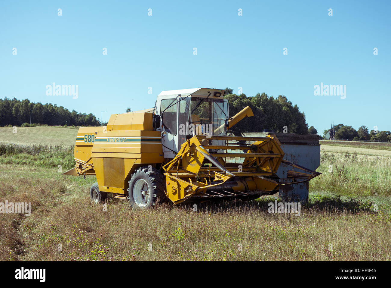 Aktiv sampo 580 Combine harvester during fall harvest Stock Photo - Alamy