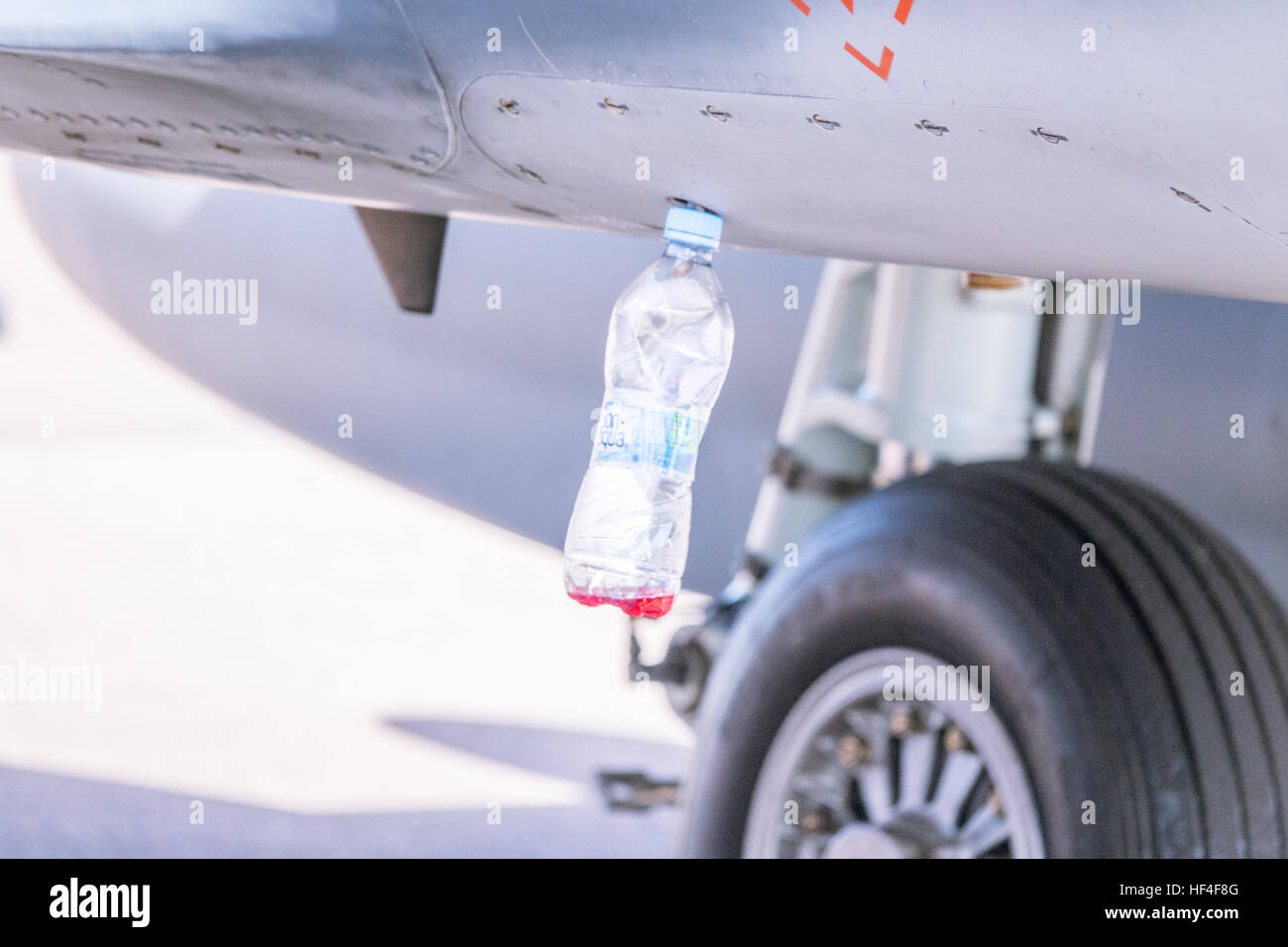 Quick fix, Czech jet fighter, plastic bottle under a jet fighter on an ...